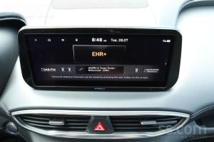 Black Hyundai Santa Fe 2022 in Riga, with an engine capacity of 1.60 L and mileage of 66 thousand km for 34000 €, photo 16 on AUTOMOTO.COM.LV