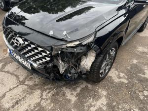 Black Hyundai Santa Fe 2022 in Kaunas, with an engine capacity of 1.60 L and mileage of 111 thousand km for 16800 €, photo 6 on AUTOMOTO.COM.LV