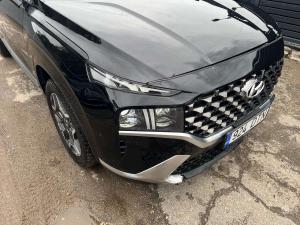 Black Hyundai Santa Fe 2022 in Kaunas, with an engine capacity of 1.60 L and mileage of 111 thousand km for 16800 €, photo 9 on AUTOMOTO.COM.LV