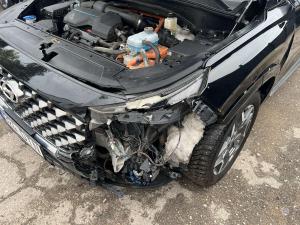 Black Hyundai Santa Fe 2022 in Kaunas, with an engine capacity of 1.60 L and mileage of 111 thousand km for 16800 €, photo 11 on AUTOMOTO.COM.LV
