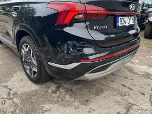 Black Hyundai Santa Fe 2022 in Kaunas, with an engine capacity of 1.60 L and mileage of 111 thousand km for 16800 €, photo 13 on AUTOMOTO.COM.LV