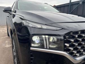 Black Hyundai Santa Fe 2022 in Kaunas, with an engine capacity of 1.60 L and mileage of 111 thousand km for 16800 €, photo 16 on AUTOMOTO.COM.LV