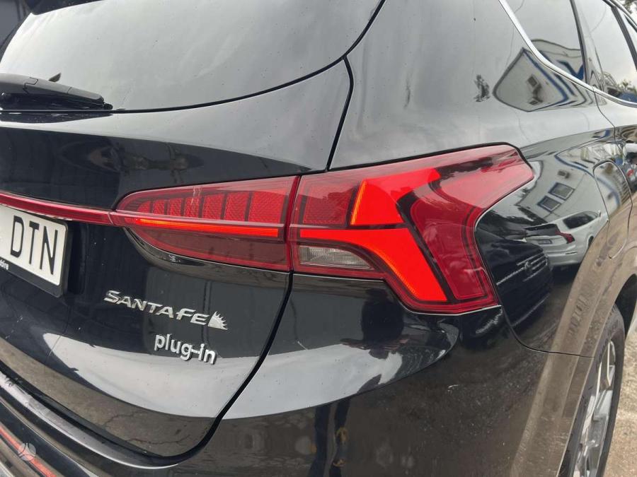 Black Hyundai Santa Fe 2022 in Kaunas, with an engine capacity of 1.60 L and mileage of 111 thousand km for 16800 €, photo 17 on AUTOMOTO.COM.LV