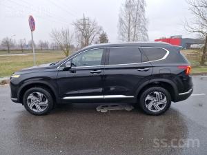 Black Hyundai Santa Fe 2023 in Riga, with an engine capacity of 2.50 L and mileage of 22 thousand km for 34500 €, photo  on AUTOMOTO.COM.LV