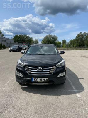 Melns Hyundai Santa Fe 2013 Rīga, ar dzinēja tilpumu 2.20 L un nobraukumu 361 tūkst. km par 7200 €, foto  vietnē AUTOMOTO.COM.LV