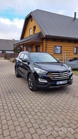 Melns Hyundai Santa Fe 2014 Rīga, ar dzinēja tilpumu 2.20 L un nobraukumu 190 tūkst. km par 8800 €, foto 3 vietnē AUTOMOTO.COM.LV
