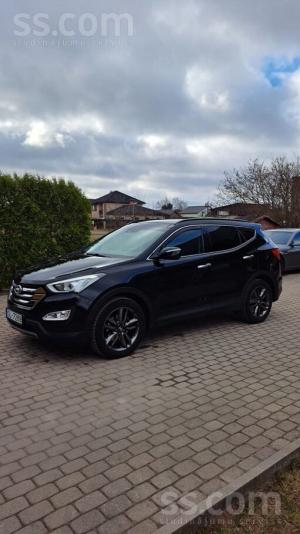 Melns Hyundai Santa Fe 2014 Rīga, ar dzinēja tilpumu 2.20 L un nobraukumu 190 tūkst. km par 8800 €, foto 4 vietnē AUTOMOTO.COM.LV