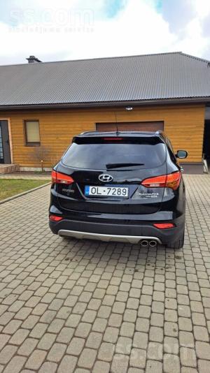 Melns Hyundai Santa Fe 2014 Rīga, ar dzinēja tilpumu 2.20 L un nobraukumu 190 tūkst. km par 8800 €, foto 6 vietnē AUTOMOTO.COM.LV