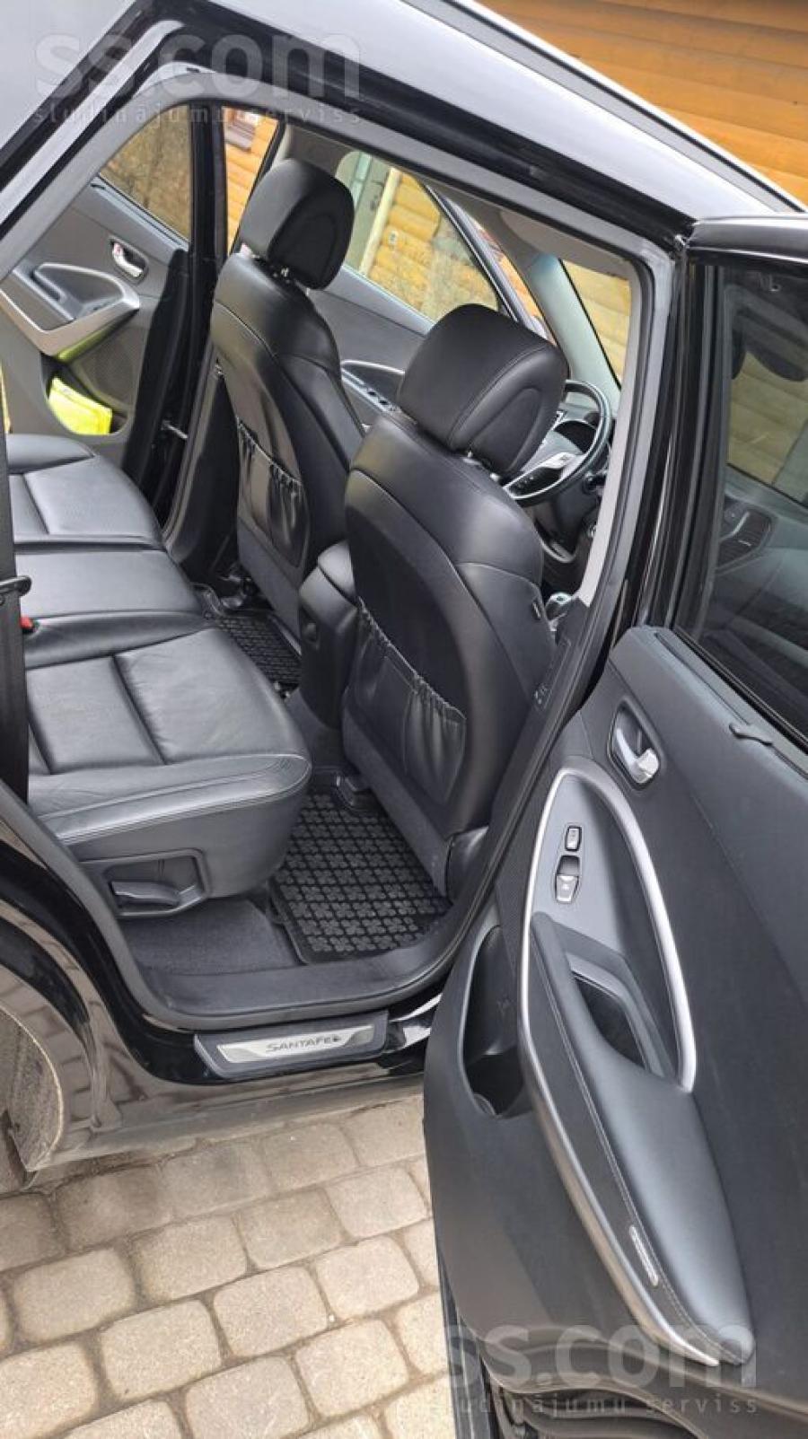 Melns Hyundai Santa Fe 2014 Rīga, ar dzinēja tilpumu 2.20 L un nobraukumu 190 tūkst. km par 8800 €, foto 7 vietnē AUTOMOTO.COM.LV