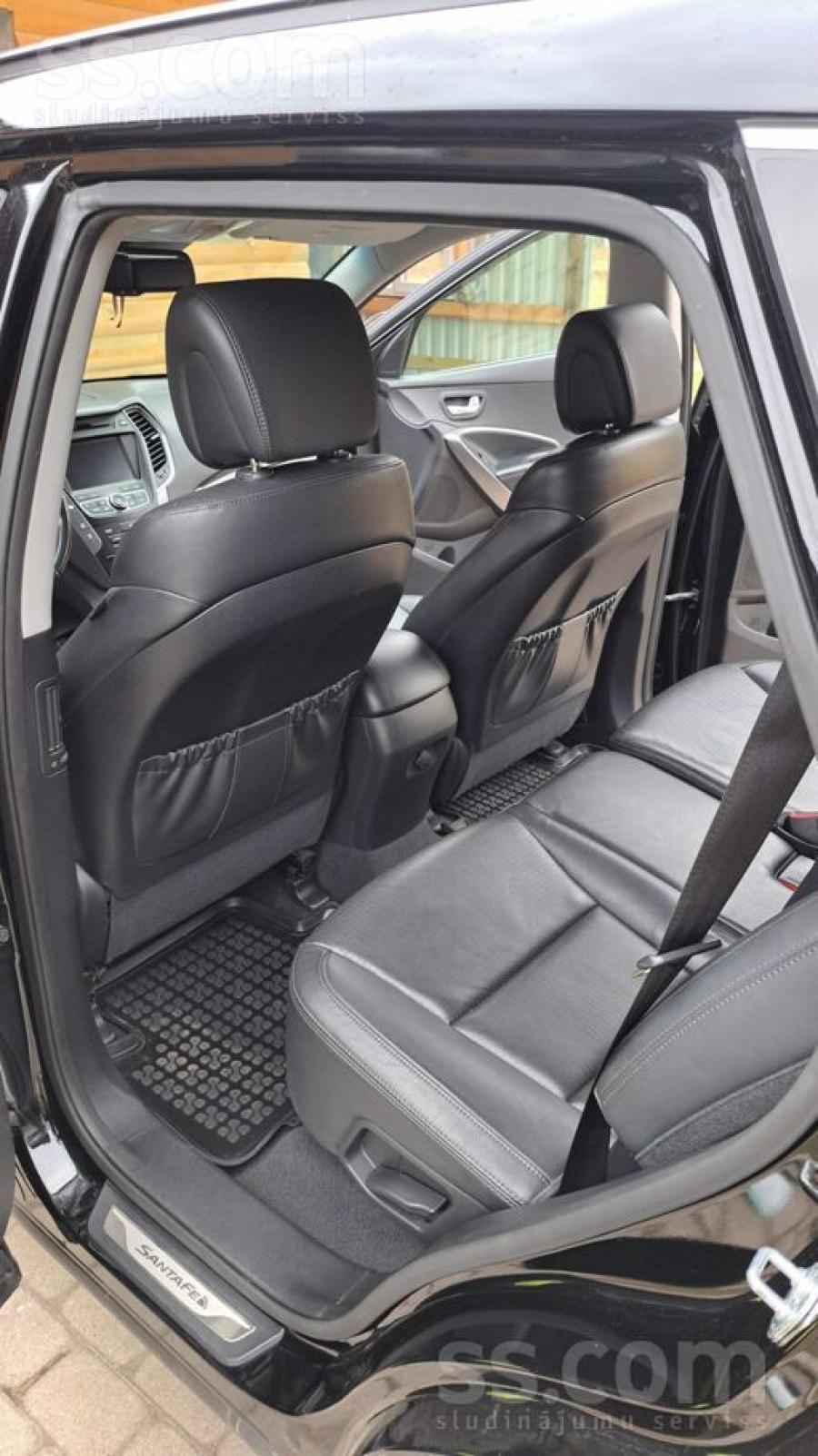 Melns Hyundai Santa Fe 2014 Rīga, ar dzinēja tilpumu 2.20 L un nobraukumu 190 tūkst. km par 8800 €, foto 8 vietnē AUTOMOTO.COM.LV