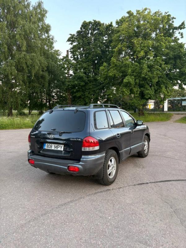 Blue Hyundai Santa Fe 2003 in Tallinn, with an engine capacity of 0.00 L and mileage of 370 thousand km for 2000 €, photo 5 on AUTOMOTO.COM.LV