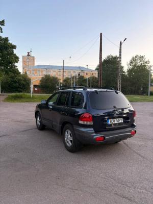 Zils Hyundai Santa Fe 2003 Tallina, ar dzinēja tilpumu 0.00 L un nobraukumu 370 tūkst. km par 2000 €, foto 7 vietnē AUTOMOTO.COM.LV
