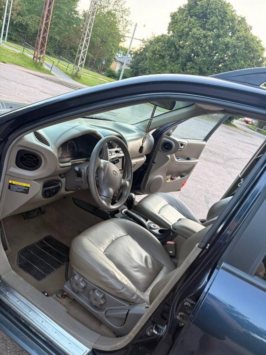 Zils Hyundai Santa Fe 2003 Tallina, ar dzinēja tilpumu 0.00 L un nobraukumu 370 tūkst. km par 2000 €, foto 19 vietnē AUTOMOTO.COM.LV