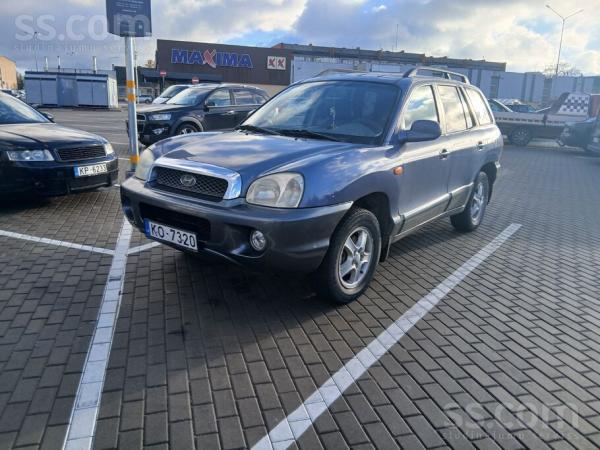 Хендай Санта Фе 2003 в Даугавпилс на AUTOMOTO.COM.LV Синий Хендай Санта Фе 2003 в Даугавпилс, объемом двигателя 2.40 л и пробегом 255 тыс. км за 2100 €, фото 4 на AUTOMOTO.COM.LV