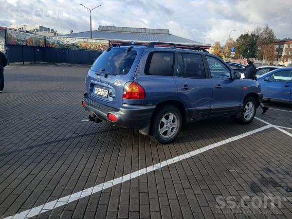 Zils Hyundai Santa Fe 2003 Daugavpils, ar dzinēja tilpumu 2.40 L un nobraukumu 255 tūkst. km par 2100 €, foto 1 vietnē AUTOMOTO.COM.LV