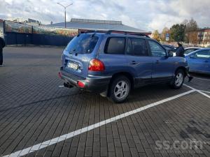Blue Hyundai Santa Fe 2003 in Daugavpils, with an engine capacity of 2.40 L and mileage of 255 thousand km for 2100 €, photo  on AUTOMOTO.COM.LV