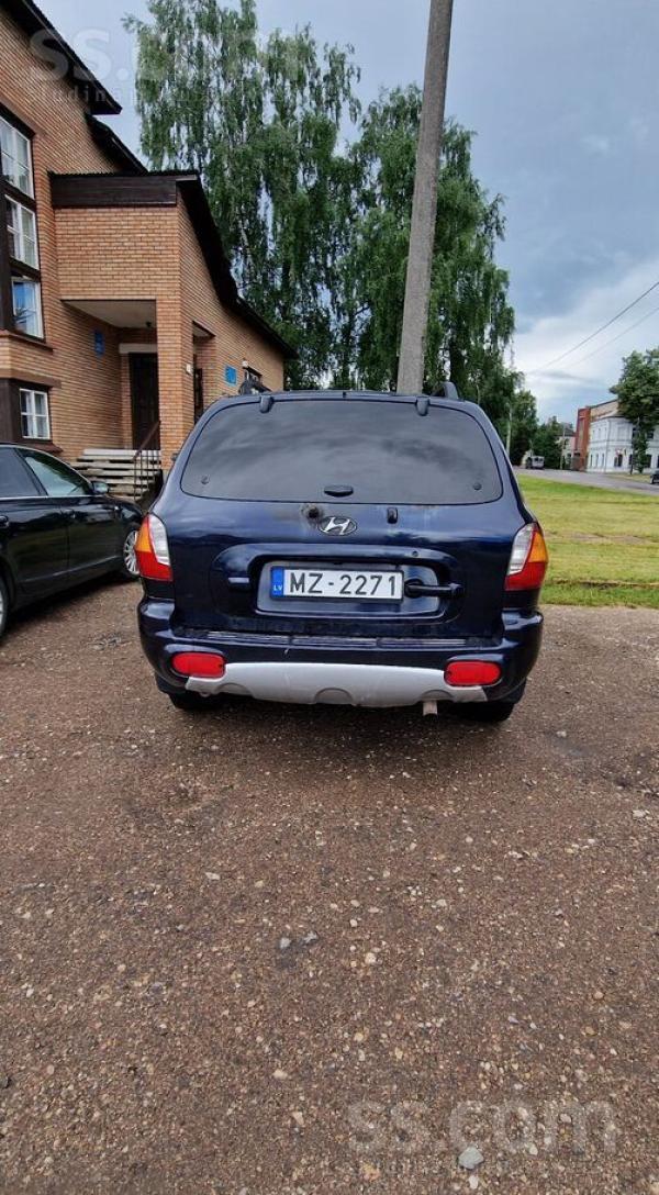 Blue Hyundai Santa Fe 2004 in Daugavpils, with an engine capacity of 2.00 L and mileage of 331 thousand km for 1200 €, photo 7 on AUTOMOTO.COM.LV