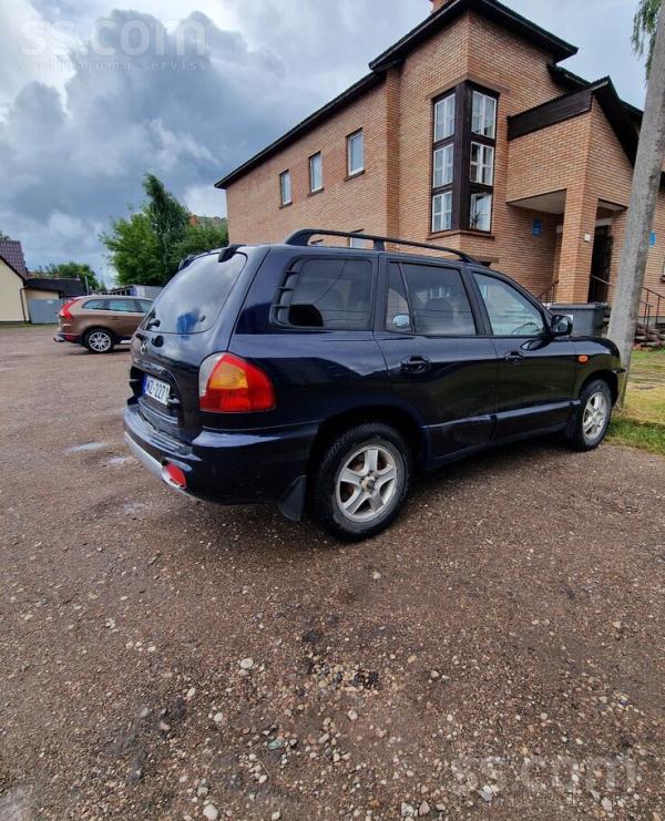 Zils Hyundai Santa Fe 2004 Daugavpils, ar dzinēja tilpumu 2.00 L un nobraukumu 395 tūkst. km par 1000 €, foto 3 vietnē AUTOMOTO.COM.LV