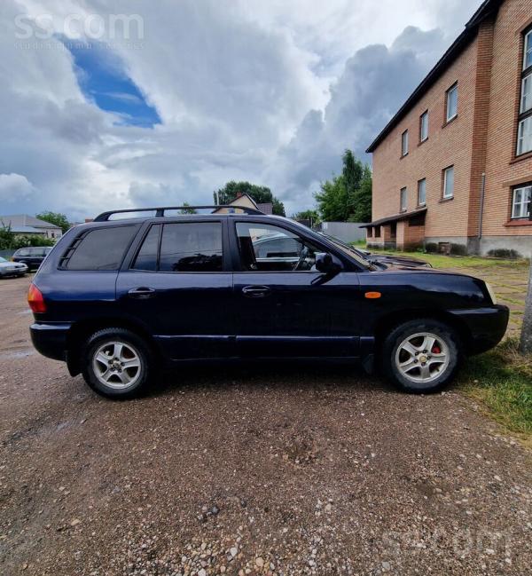 Zils Hyundai Santa Fe 2004 Daugavpils, ar dzinēja tilpumu 2.00 L un nobraukumu 395 tūkst. km par 1000 €, foto 4 vietnē AUTOMOTO.COM.LV