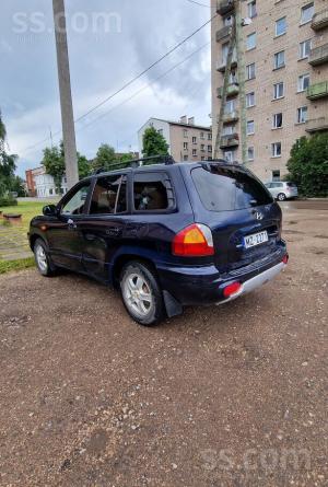 Blue Hyundai Santa Fe 2004 in Daugavpils, with an engine capacity of 2.00 L and mileage of 395 thousand km for 1000 €, photo 7 on AUTOMOTO.COM.LV