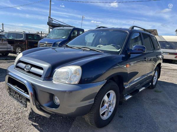 Blue Hyundai Santa Fe 2005 in Kaunas, with an engine capacity of 1.99 L and mileage of 265 thousand km for 2450 €, photo 1 on AUTOMOTO.COM.LV