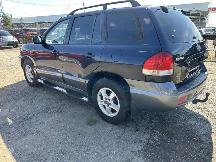 Blue Hyundai Santa Fe 2005 in Kaunas, with an engine capacity of 1.99 L and mileage of 265 thousand km for 2450 €, photo 3 on AUTOMOTO.COM.LV