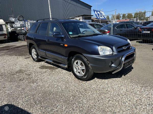 Blue Hyundai Santa Fe 2005 in Kaunas, with an engine capacity of 1.99 L and mileage of 265 thousand km for 2450 €, photo 4 on AUTOMOTO.COM.LV