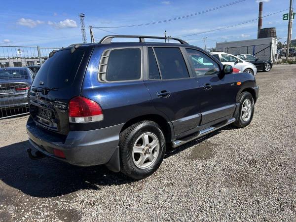 Blue Hyundai Santa Fe 2005 in Kaunas, with an engine capacity of 1.99 L and mileage of 265 thousand km for 2450 €, photo 6 on AUTOMOTO.COM.LV