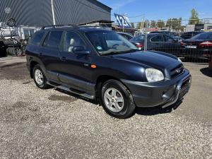 Blue Hyundai Santa Fe 2005 in Kaunas, with an engine capacity of 1.99 L and mileage of 265 thousand km for 2450 €, photo 7 on AUTOMOTO.COM.LV