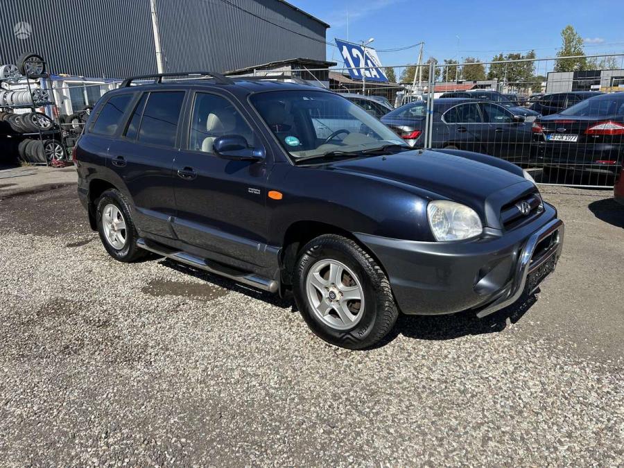 Blue Hyundai Santa Fe 2005 in Kaunas, with an engine capacity of 1.99 L and mileage of 265 thousand km for 2450 €, photo 7 on AUTOMOTO.COM.LV