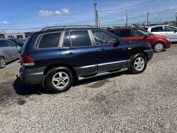Blue Hyundai Santa Fe 2005 in Kaunas, with an engine capacity of 1.99 L and mileage of 265 thousand km for 2450 €, photo 8 on AUTOMOTO.COM.LV