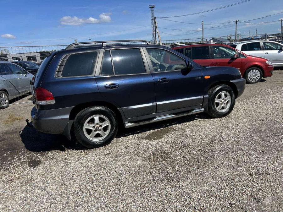 Blue Hyundai Santa Fe 2005 in Kaunas, with an engine capacity of 1.99 L and mileage of 265 thousand km for 2450 €, photo 8 on AUTOMOTO.COM.LV
