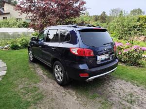 Blue Hyundai Santa Fe 2006 in Riga, with an engine capacity of 2.20 L and mileage of 260 thousand km for 7000 €, photo 3 on AUTOMOTO.COM.LV