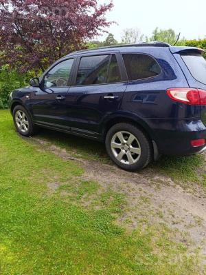 Blue Hyundai Santa Fe 2006 in Riga, with an engine capacity of 2.20 L and mileage of 260 thousand km for 7000 €, photo 4 on AUTOMOTO.COM.LV