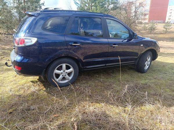 Zils Hyundai Santa Fe 2006 Daugavpils, ar dzinēja tilpumu 2.20 L un nobraukumu 191 tūkst. km par 4900 €, foto 4 vietnē AUTOMOTO.COM.LV