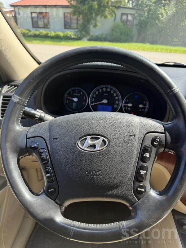 Blue Hyundai Santa Fe 2007 in Ventspils, with an engine capacity of 2.20 L and mileage of 216 thousand km for 3500 €, photo 9 on AUTOMOTO.COM.LV