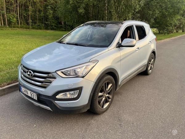 Blue Hyundai Santa Fe 2013 in Vilnius, with an engine capacity of 2.20 L and mileage of 250 thousand km for 9600 €, photo 1 on AUTOMOTO.COM.LV