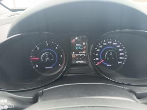 Blue Hyundai Santa Fe 2013 in Visaginas, with an engine capacity of 2.20 L and mileage of 230 thousand km for 10700 €, photo 19 on AUTOMOTO.COM.LV