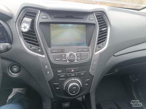 Blue Hyundai Santa Fe 2013 in Visaginas, with an engine capacity of 2.20 L and mileage of 230 thousand km for 10700 €, photo 23 on AUTOMOTO.COM.LV