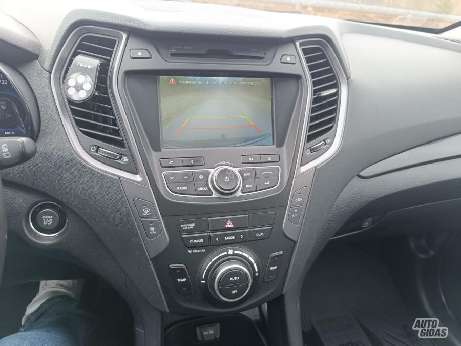 Blue Hyundai Santa Fe 2013 in Visaginas, with an engine capacity of 2.20 L and mileage of 230 thousand km for 10700 €, photo 23 on AUTOMOTO.COM.LV