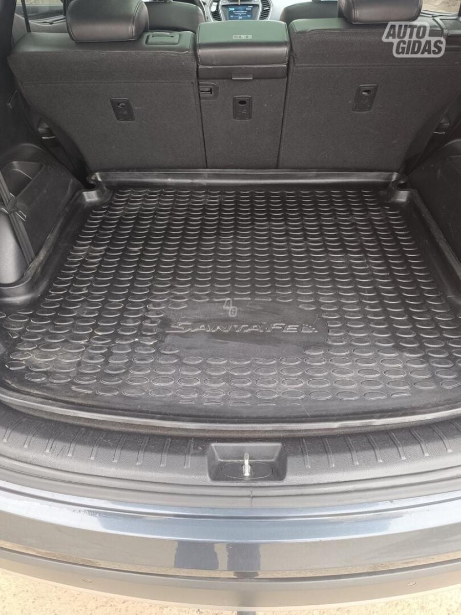 Blue Hyundai Santa Fe 2013 in Visaginas, with an engine capacity of 2.20 L and mileage of 230 thousand km for 10700 €, photo 27 on AUTOMOTO.COM.LV