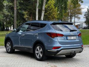 Blue Hyundai Santa Fe 2018 in Joniskis, with an engine capacity of 2.20 L and mileage of 153 thousand km for 16999 €, photo 4 on AUTOMOTO.COM.LV
