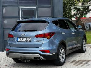 Blue Hyundai Santa Fe 2018 in Joniskis, with an engine capacity of 2.20 L and mileage of 153 thousand km for 16999 €, photo 5 on AUTOMOTO.COM.LV