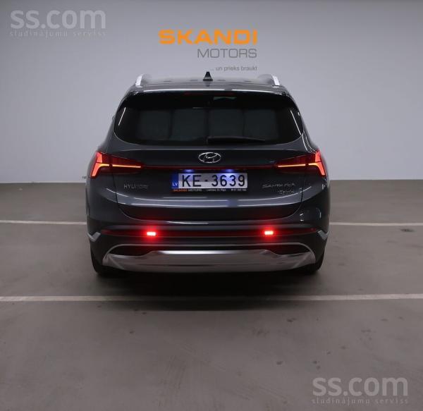 Blue Hyundai Santa Fe 2021 in Riga, with an engine capacity of 1.60 L and mileage of 60 thousand km for 30990 €, photo 5 on AUTOMOTO.COM.LV