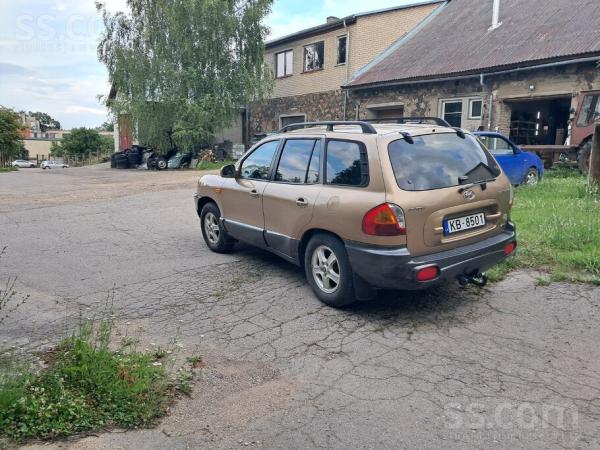 Brūns Hyundai Santa Fe 2002 Madona, ar dzinēja tilpumu 2.40 L un nobraukumu 336 tūkst. km par 1500 €, foto 3 vietnē AUTOMOTO.COM.LV
