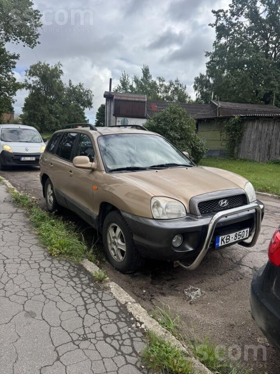 Brown Hyundai Santa Fe 2002 in Riga, with an engine capacity of 2.40 L and mileage of 347 thousand km for 1250 €, photo 1 on AUTOMOTO.COM.LV