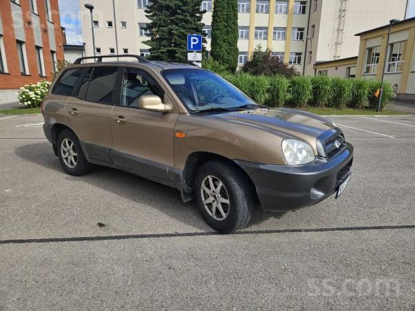 Brown Hyundai Santa Fe 2004 in Saldus, with an engine capacity of 2.40 L and mileage of 251 thousand km for 1200 €, photo 2 on AUTOMOTO.COM.LV