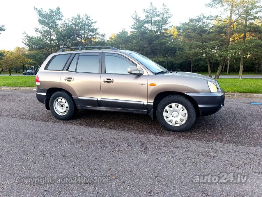 Brūns Hyundai Santa Fe 2005 Tallina, ar dzinēja tilpumu 2.00 L un nobraukumu 195 tūkst. km par 1799 €, foto 6 vietnē AUTOMOTO.COM.LV