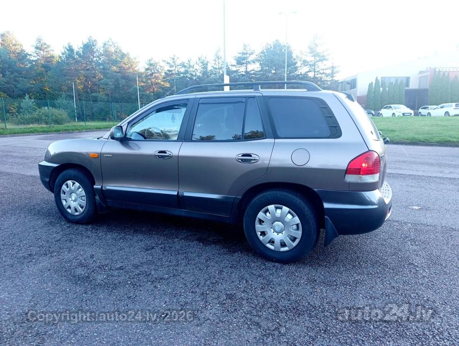 Brūns Hyundai Santa Fe 2005 Tallina, ar dzinēja tilpumu 2.00 L un nobraukumu 195 tūkst. km par 1799 €, foto 7 vietnē AUTOMOTO.COM.LV