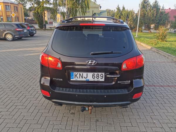 Brown Hyundai Santa Fe 2008 in Vilnius, with an engine capacity of 2.20 L and mileage of 262 thousand km for 2750 €, photo 4 on AUTOMOTO.COM.LV
